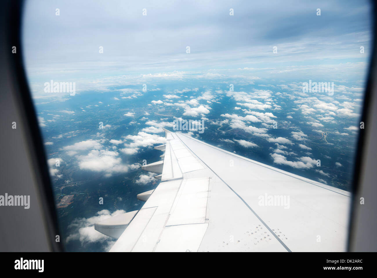 Looking through window aircraft during flight in wing with a nice blue ...
