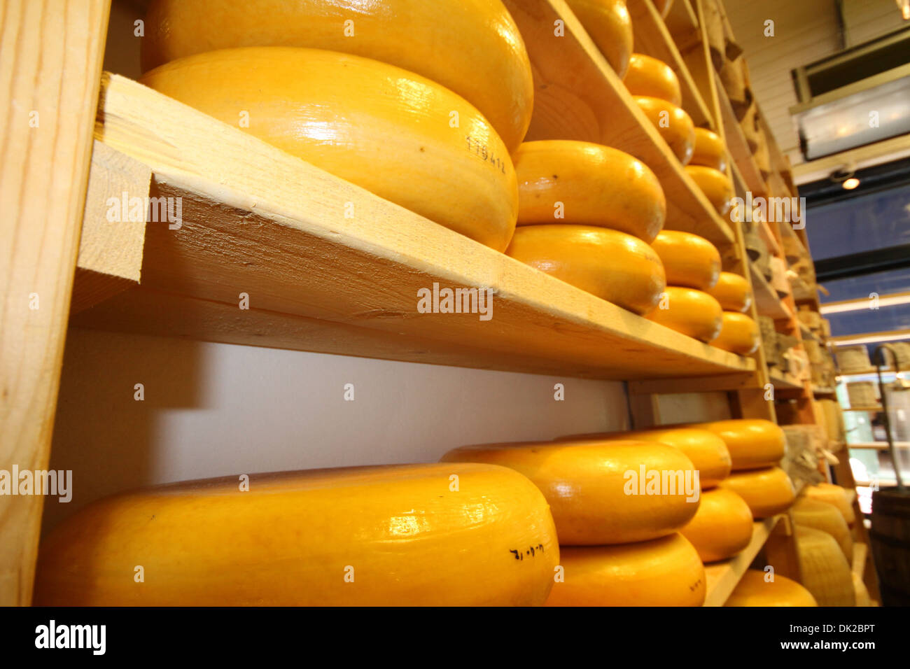 Stacked cheese wheels hi-res stock photography and images - Alamy