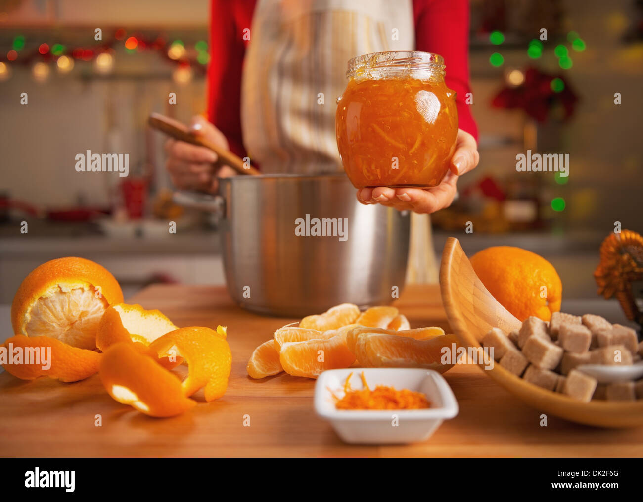 Woman making jam in kitchen hi-res stock photography and images - Alamy