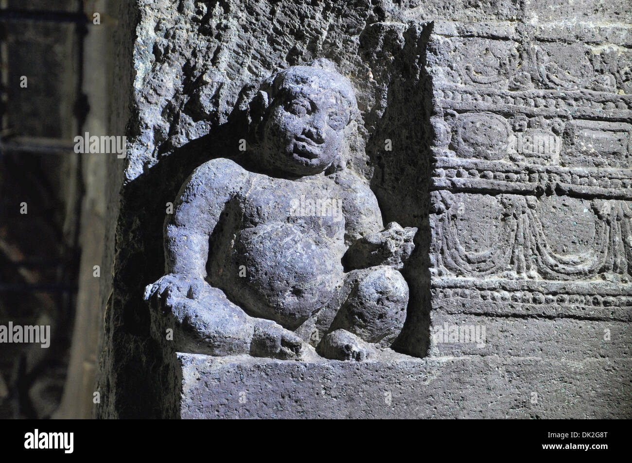 Cave No 4: Dwarf figure on one of the pillar close to the antechamber ...