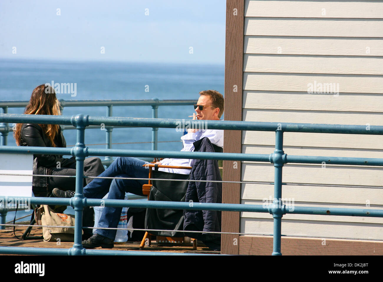Actor Kiefer Sutherland smoking a cigarette seen on set of 'Touch ...