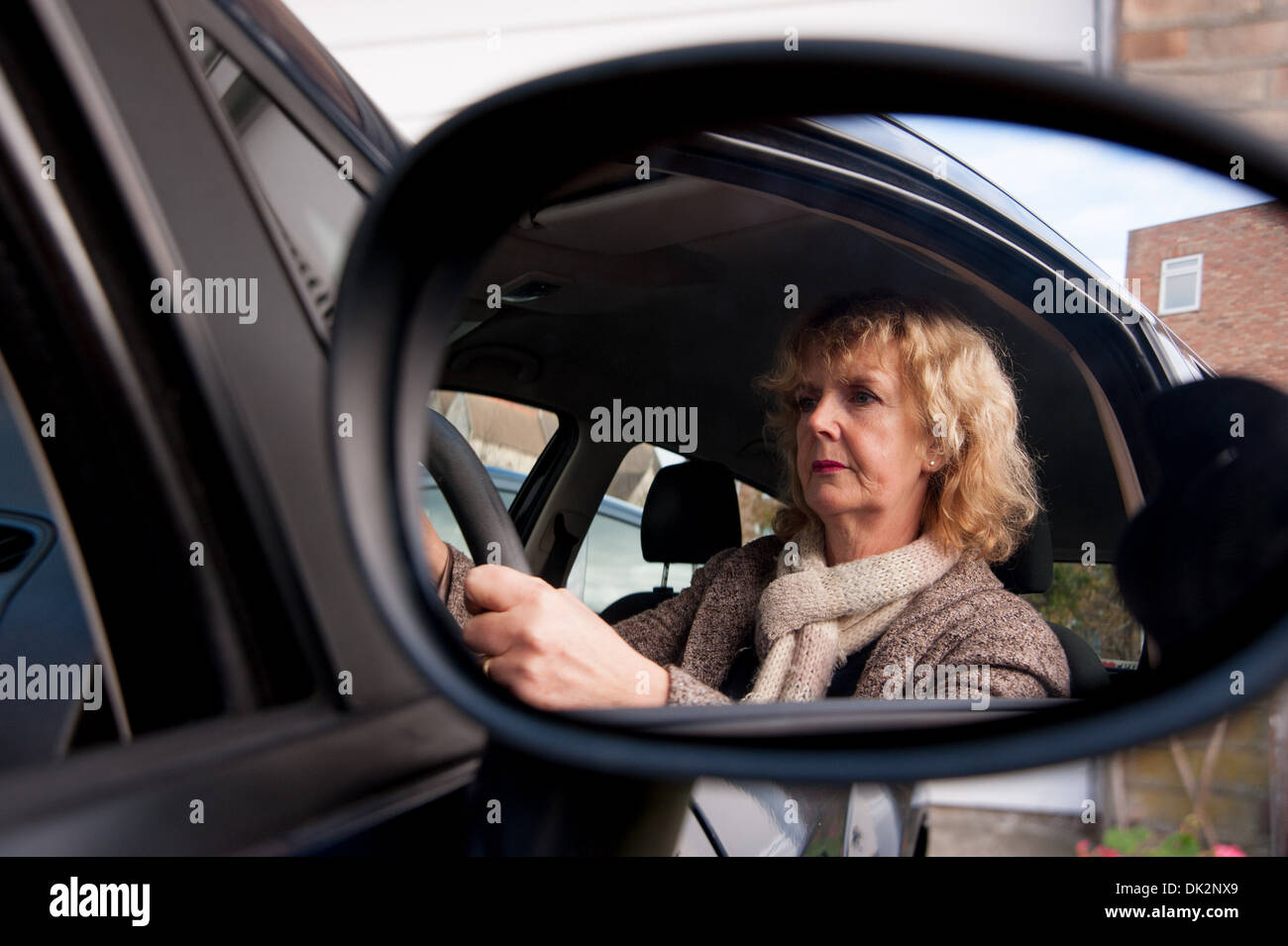 Female reversing car hi-res stock photography and images - Alamy