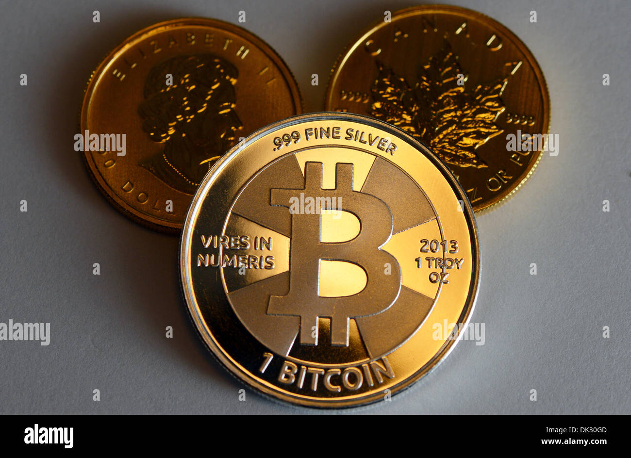 Berlin, Germany. 28th Nov, 2013. ILLUSTRATION - One Bitcoin and two ...