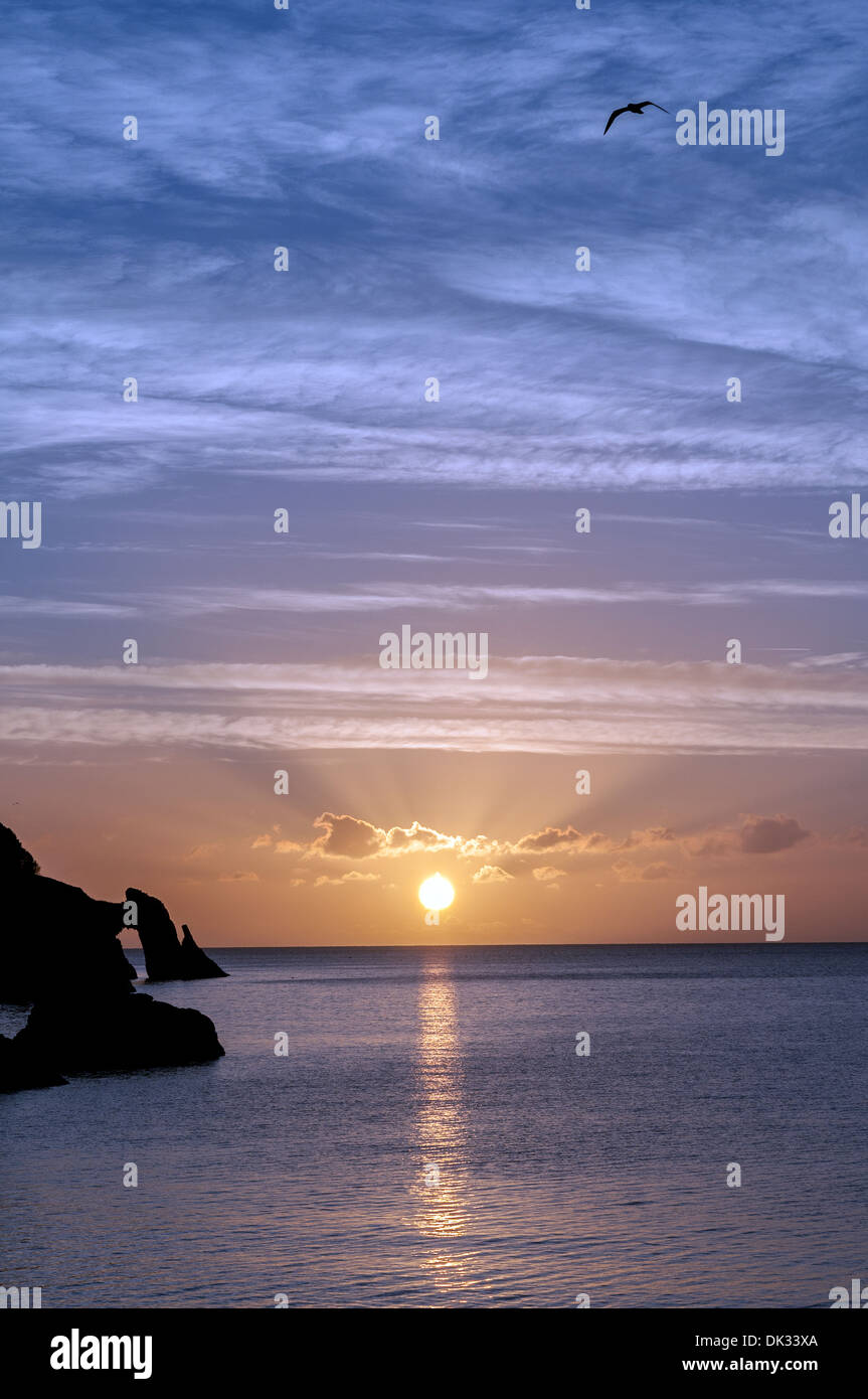 sunrise over Torquay,Devon,a natural arch of limestone called London ...