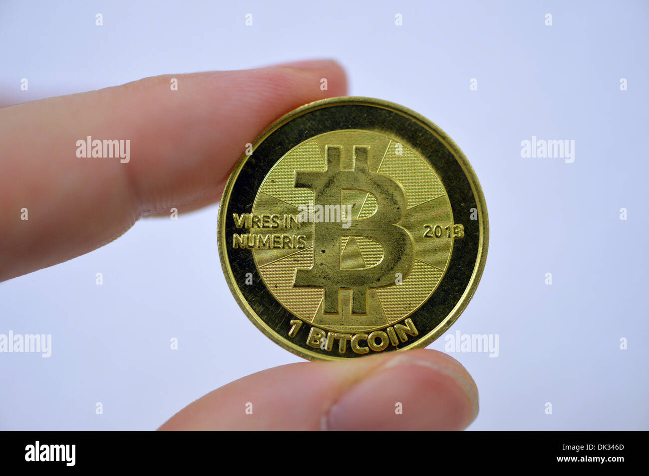 Berlin, Germany. 24th Nov, 2013. ILLUSTRATION - A Bitcoin is ...