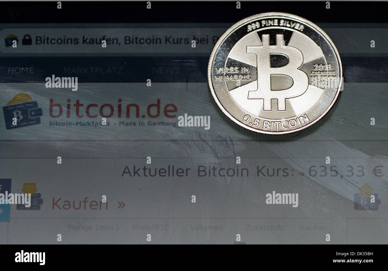 illustration-a-silver-bitcoin-lies-on-the-display-of-a-smartphone-on