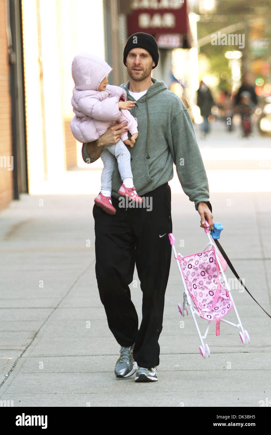 Jason Hoppy and his daughter Bryn take their dog for a walk in ...