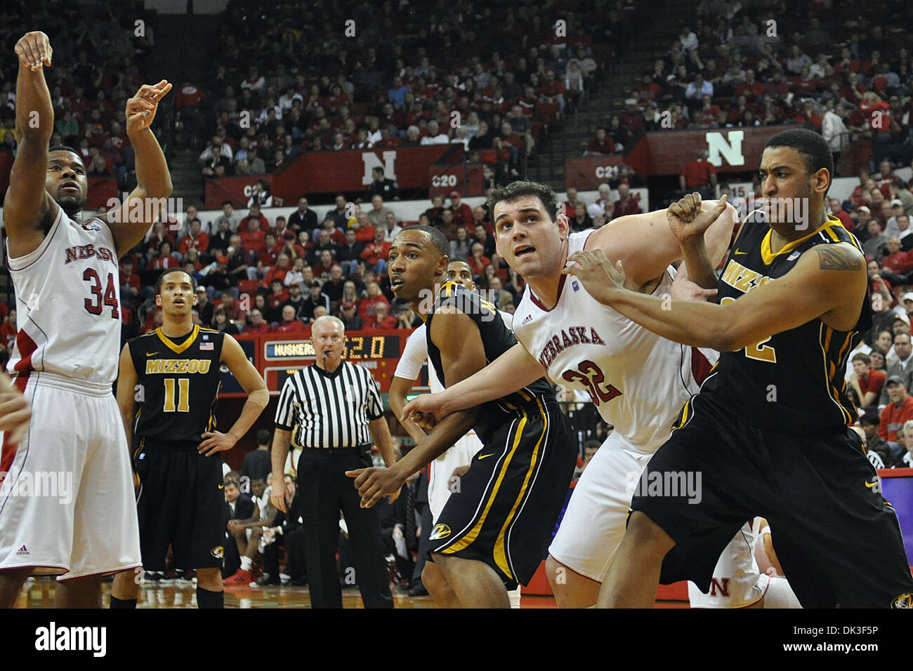 Mar. 1, 2011 - Lincoln, Nebraska, U.S - Andre Almeida (#32) battles for ...