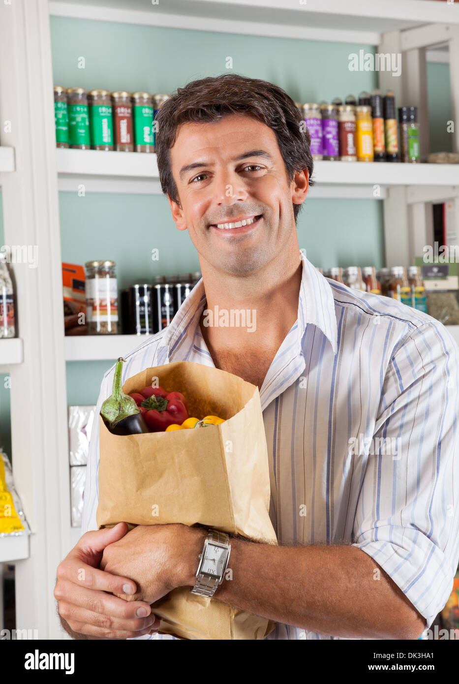 Man With Vegetable Bag In Grocery Store Stock Photo - Alamy