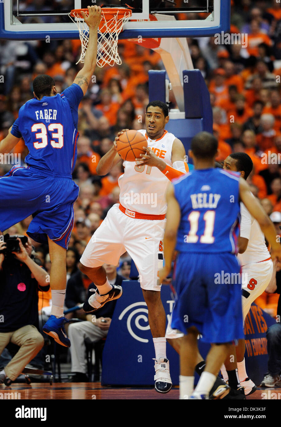 March 05, 2011: Syracuse forward Fab Melo (#51) grabs the rebound while ...