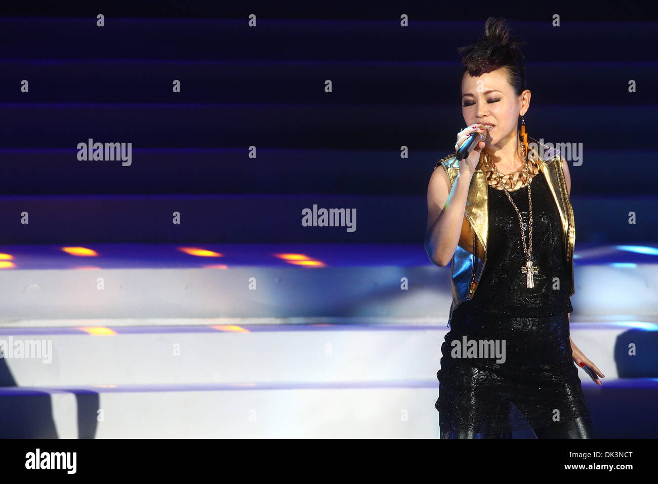 Taipei, China. 30th Nov, 2013. Singer Julia Peng perfomrs at her world ...