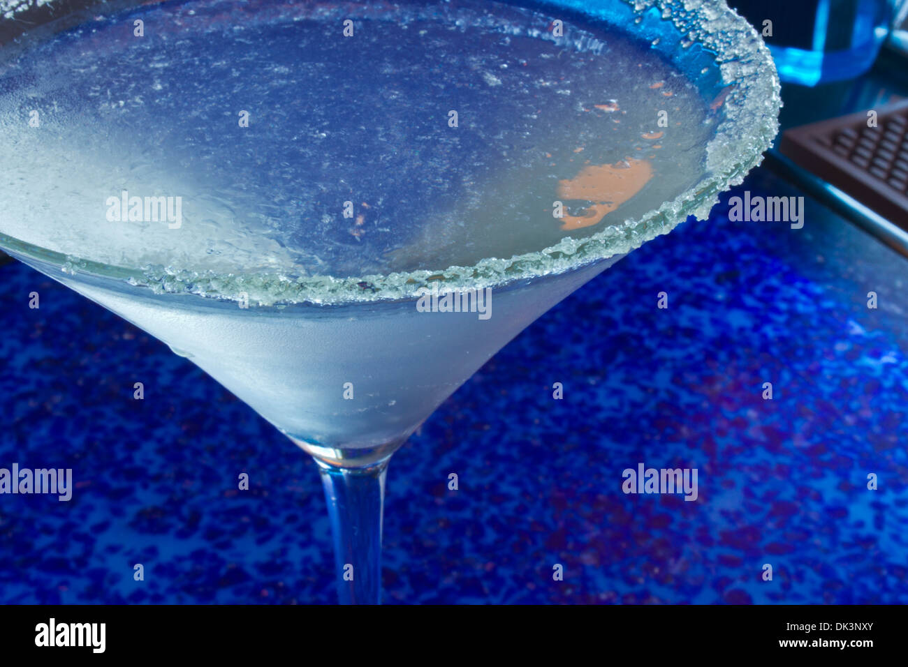 Single Martini on a Bright Blue Background Stock Photo - Alamy