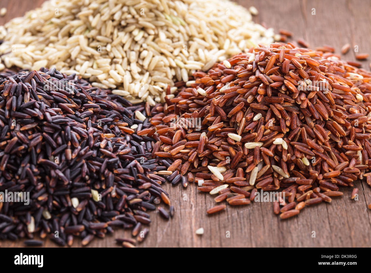 Healthy rice variety: brown, red and wild black Stock Photo - Alamy
