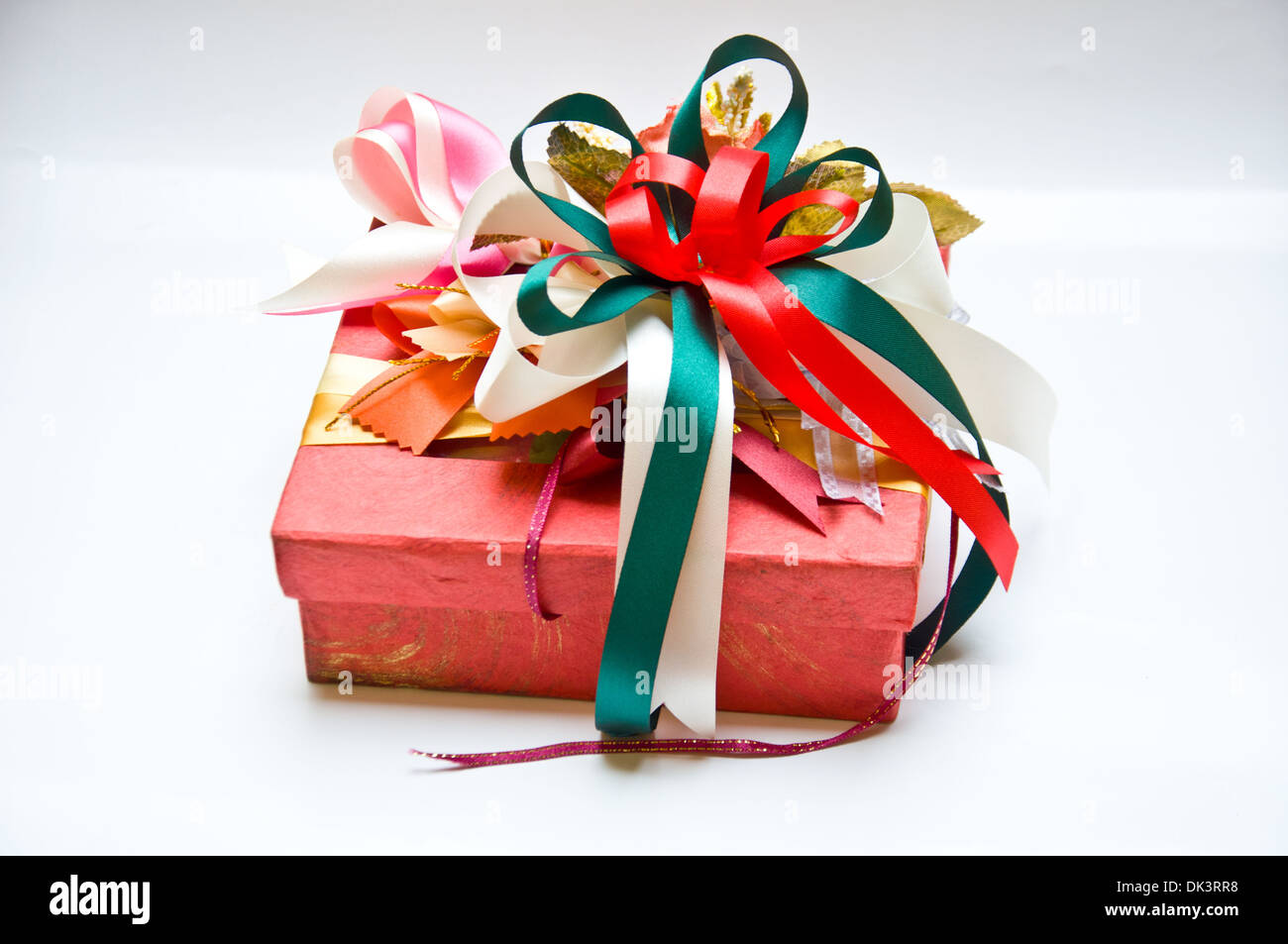 red box and green red bow on white background Stock Photo - Alamy