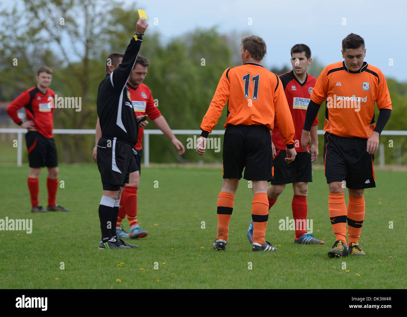 Yellow card waved by referee for foul play at Foxash football club ...