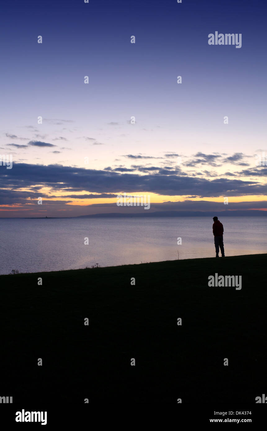 Man cliff sunset hi-res stock photography and images - Alamy