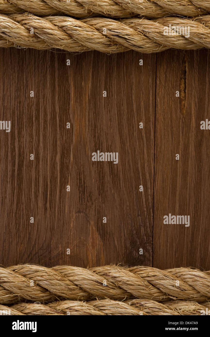 ship ropes on wood background texture Stock Photo - Alamy