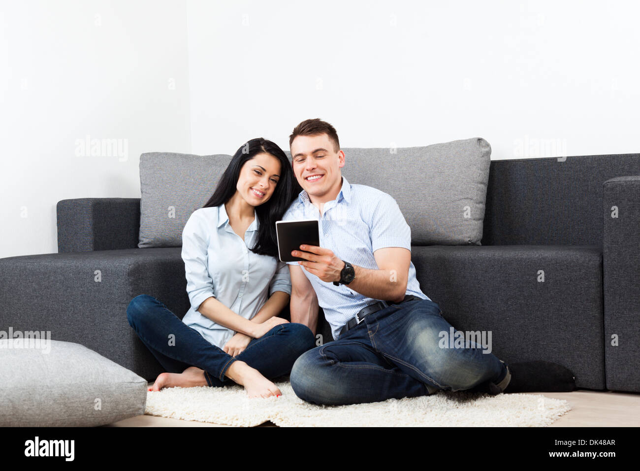 young couple living room Stock Photo - Alamy
