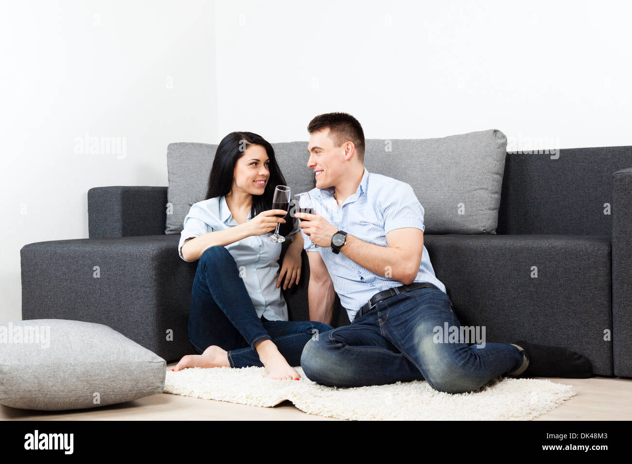 young couple living room Stock Photo - Alamy