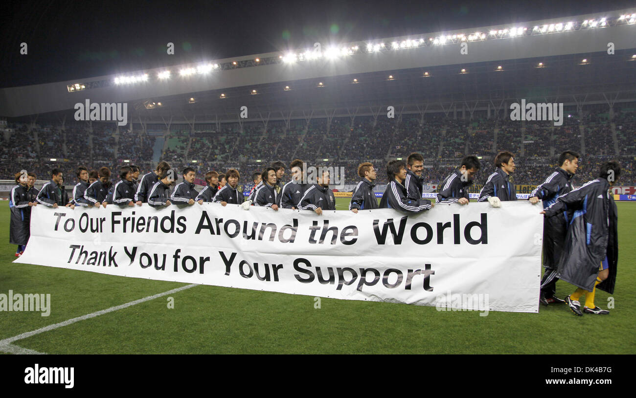 Mar. 29, 2011 - Osaka, Japan - Players hold the sign during the charity ...