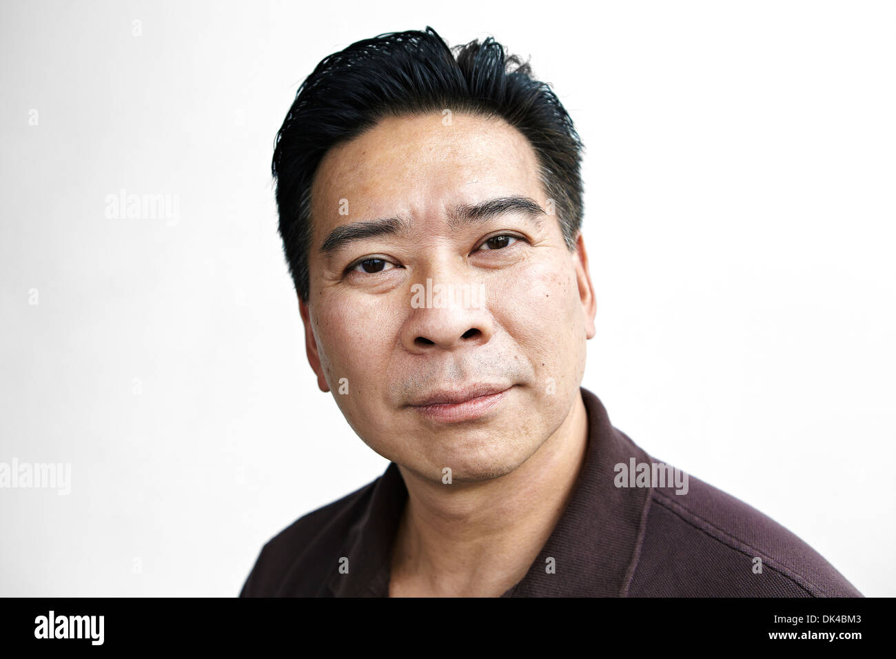 Portrait of looking at camera Stock Photo - Alamy