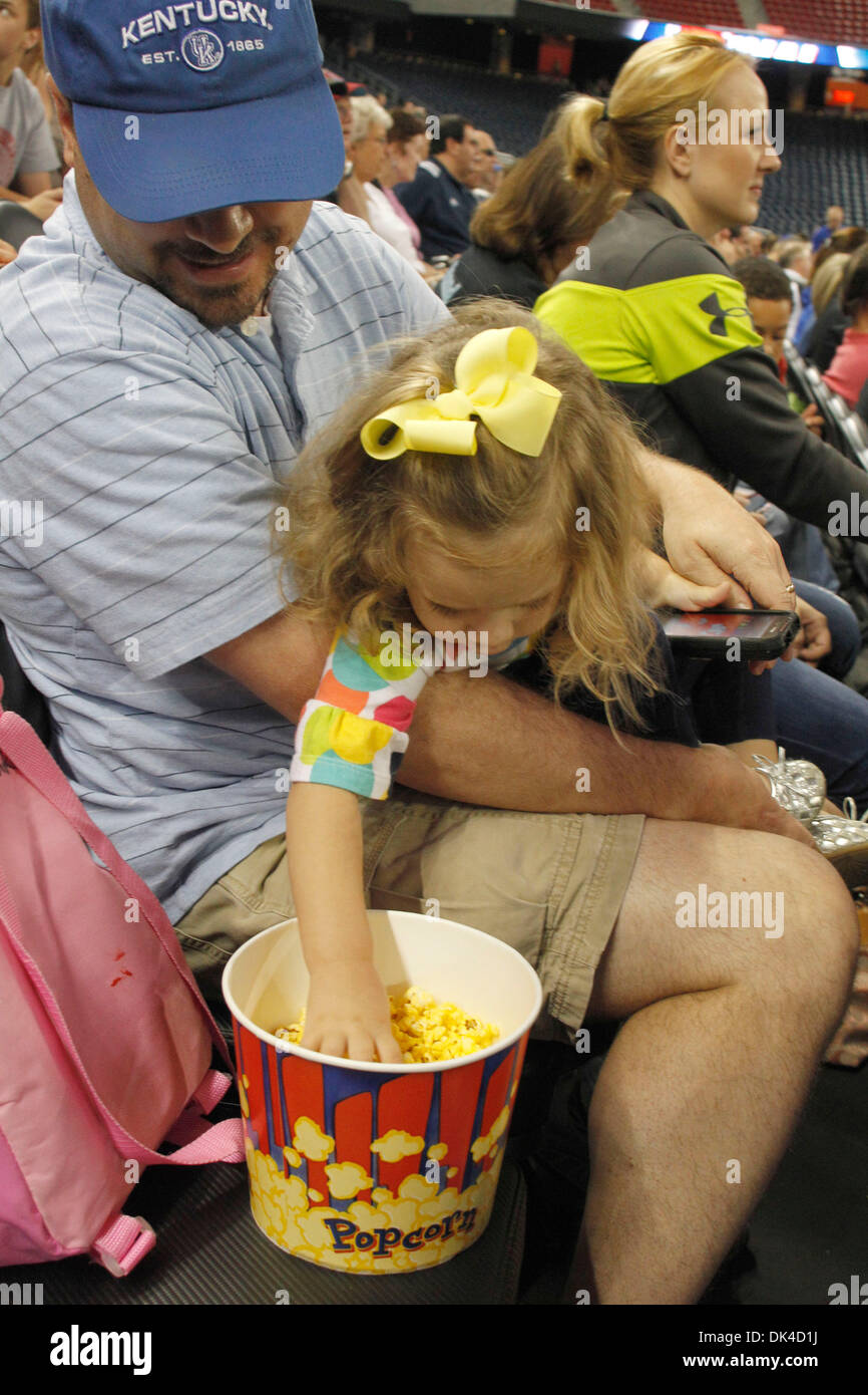 Apr. 1, 2011 - Houston, TX, USA - Ellie Shanks, 2, grabbed some popcorn ...