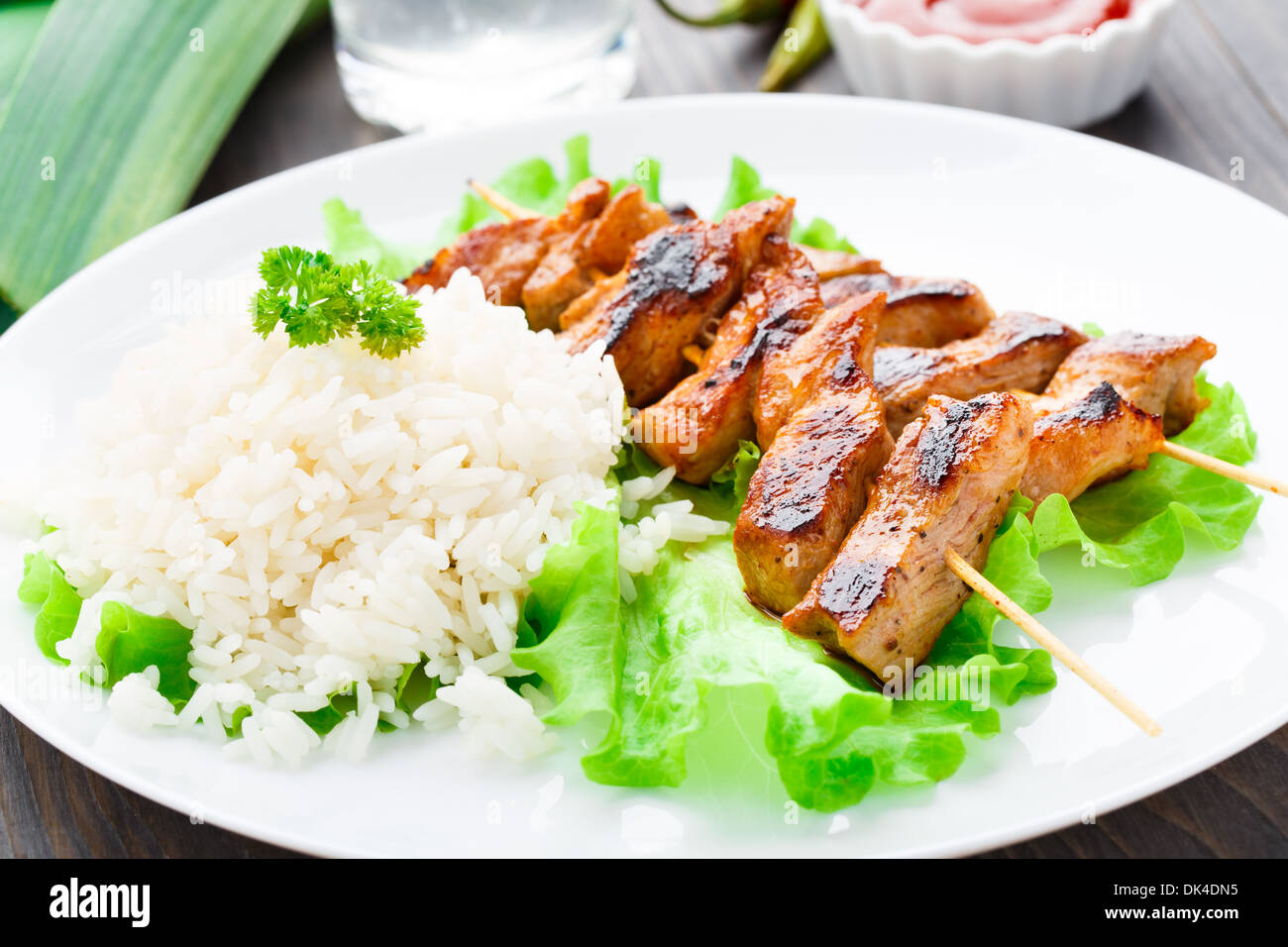 Grilled marinated pork with rice Stock Photo - Alamy