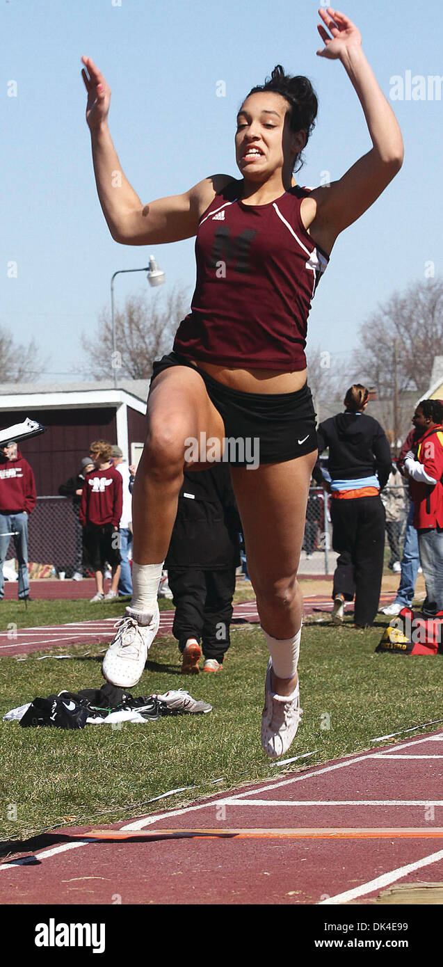 Apr. 2, 2011 - Iowa, U.S. - Moline's Brittany Bush does the long jump ...