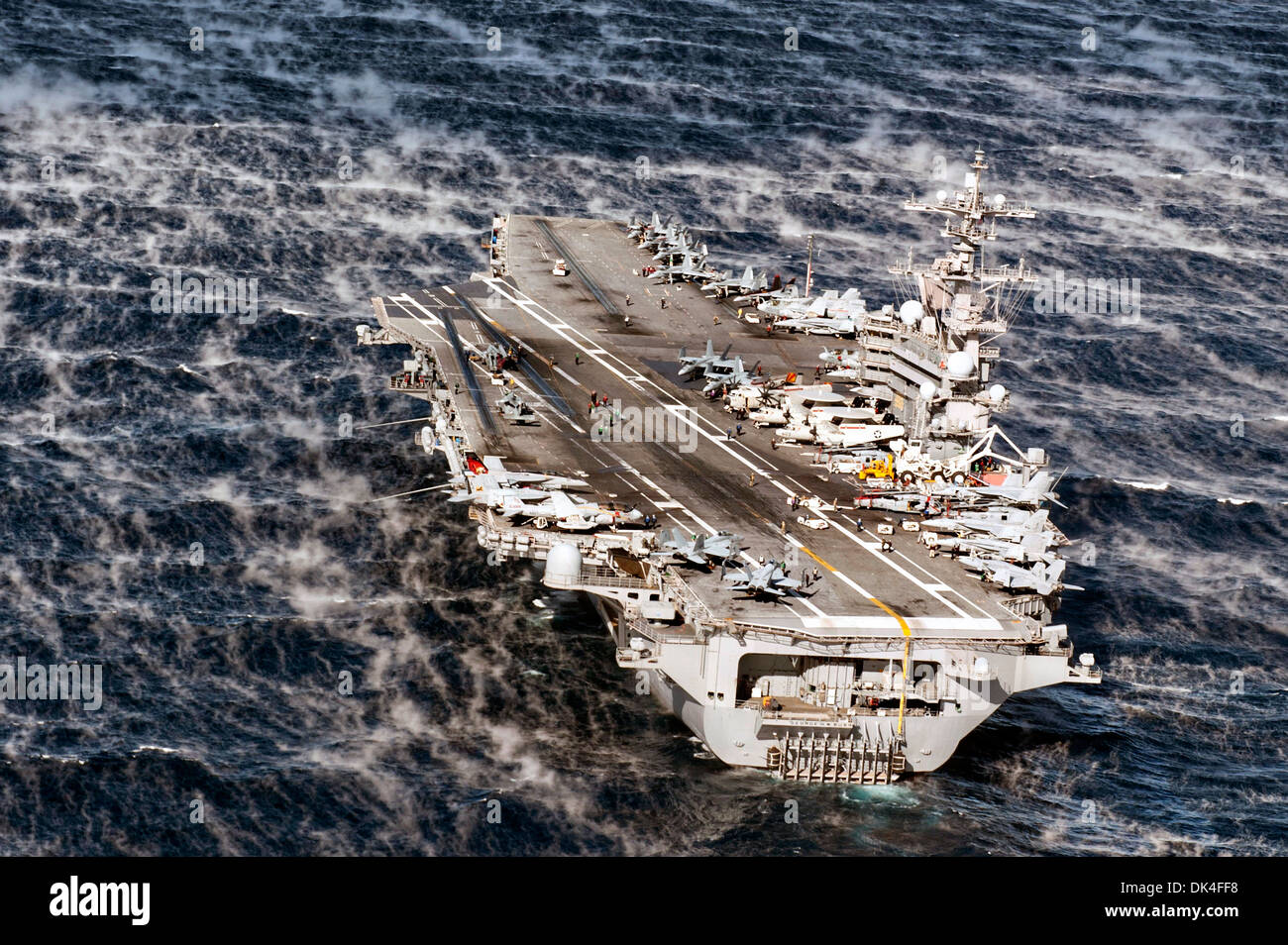 US Navy nuclear powered aircraft carrier USS George H.W. Bush steams ...