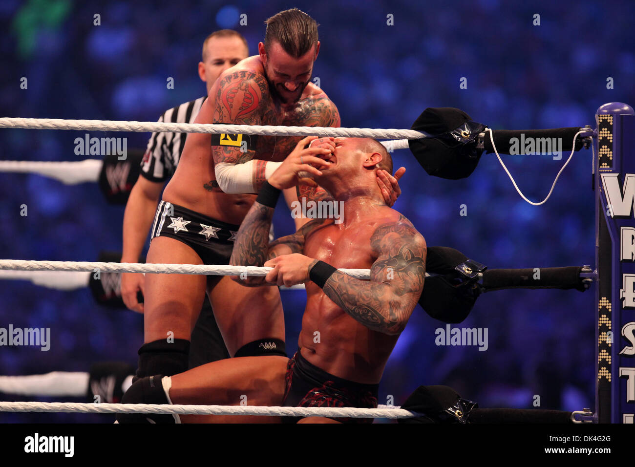 Apr 03, 2011 - Atlanta, Georgia, U.S. - CM PUNK rakes the eyes of Randy Orton at Wrestlemania ...