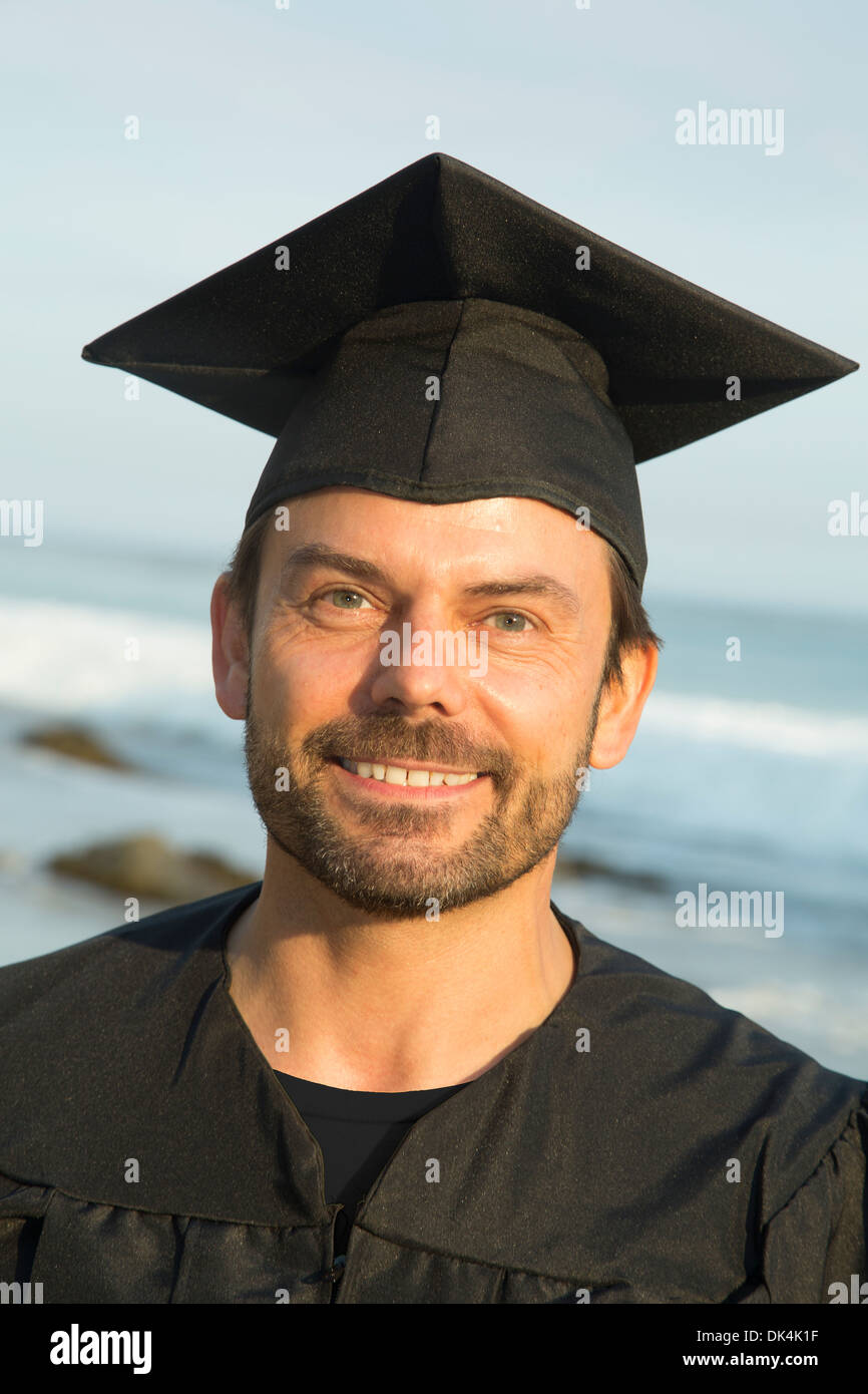 Happy male graduate hi-res stock photography and images - Alamy