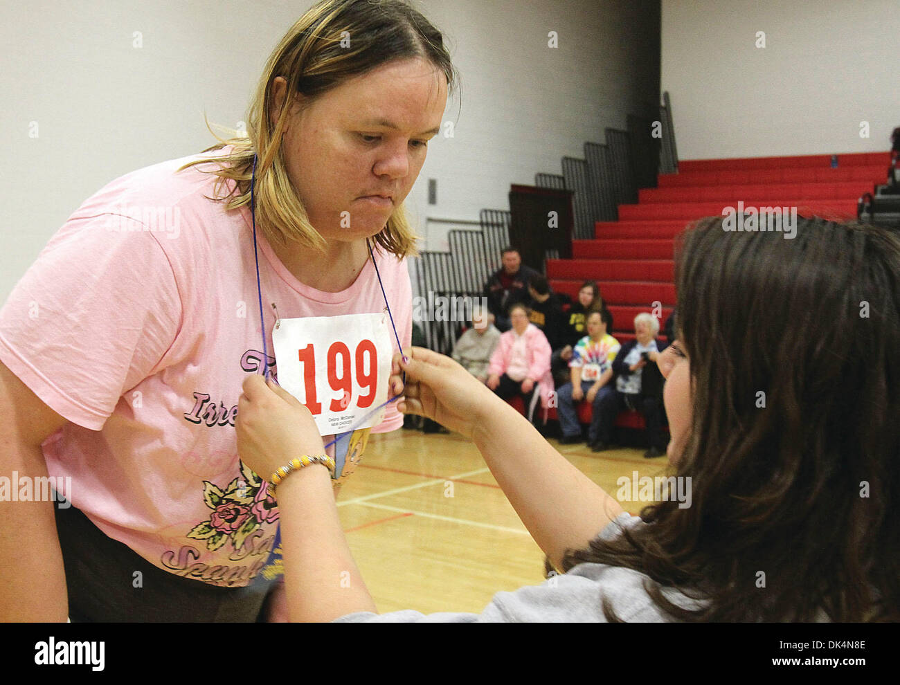 Apr. 9, 2011 - Iowa, U.S. - Ashley Sampson puts a medal onto Debra ...