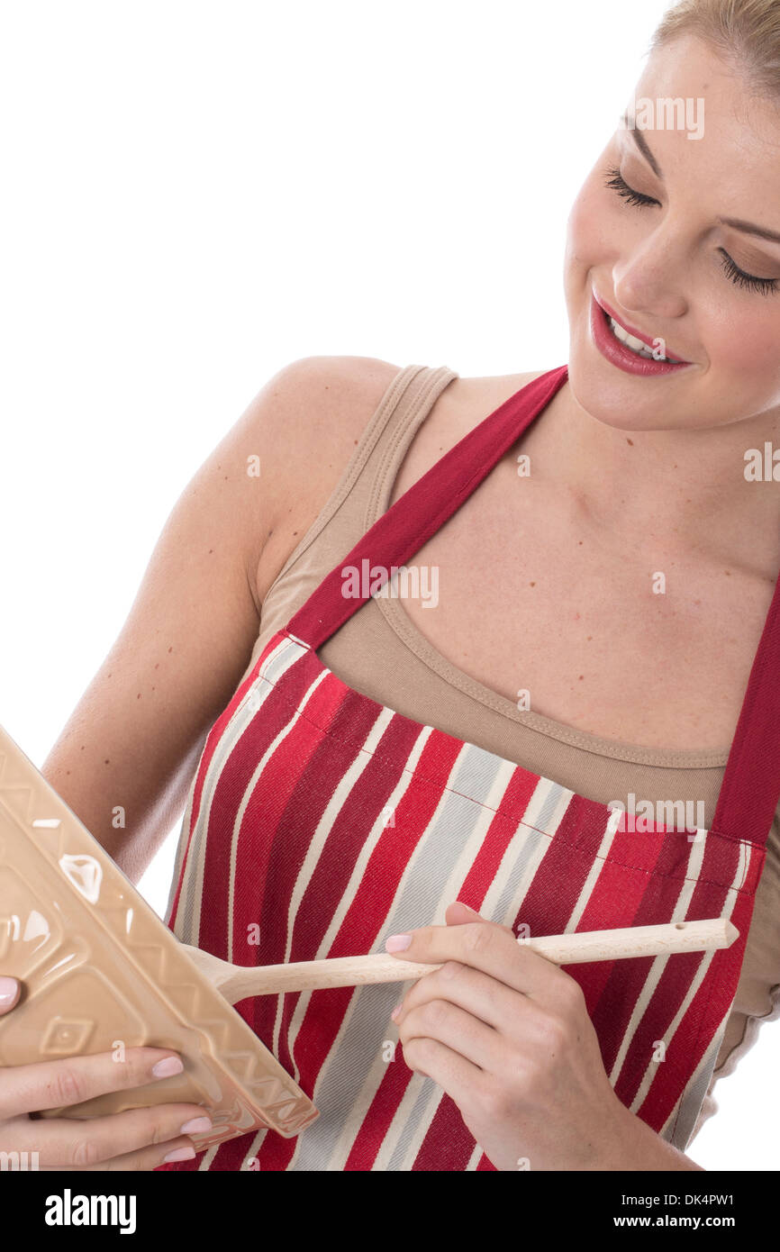 Model Released. Attractive Young Woman Mixing Cooking Ingredients Stock ...