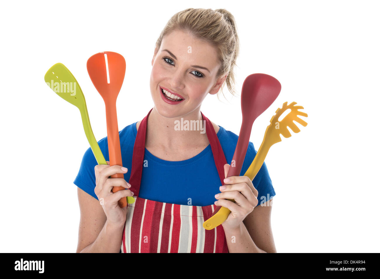 Kitchen woman cooking holding utensils hi-res stock photography and ...