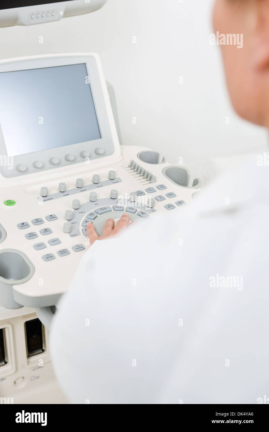 Female doctor using ultrasound hi-res stock photography and images - Alamy