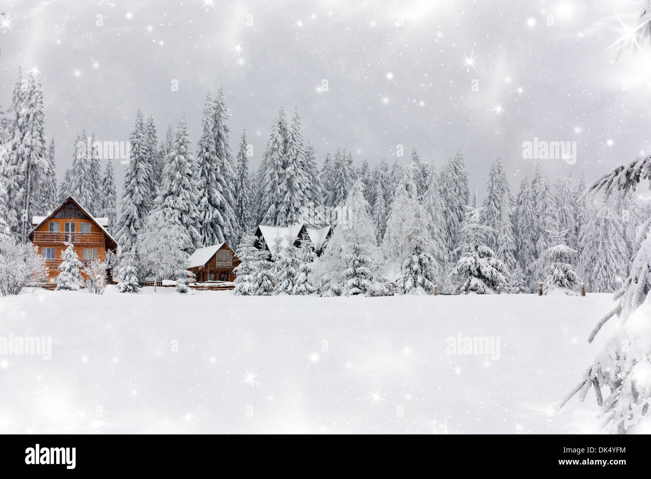 Mountain cottages in the winter landscape Stock Photo - Alamy