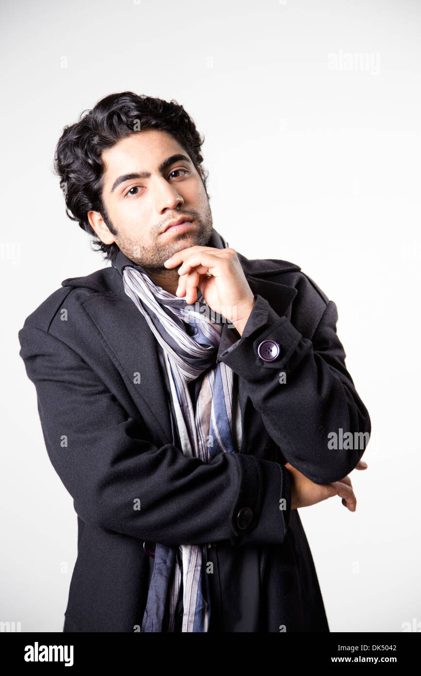 Young Indian man contemplating Stock Photo - Alamy