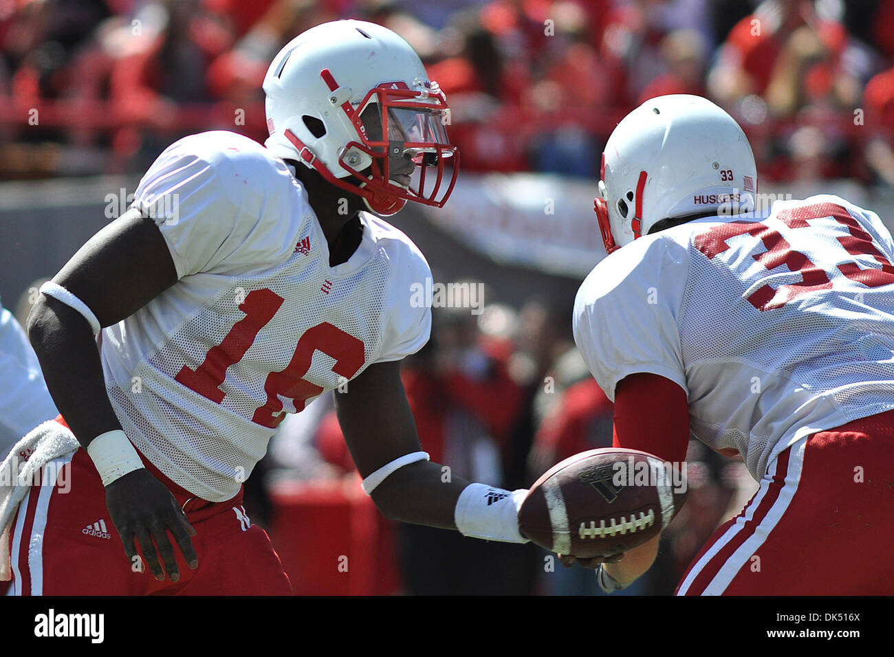 Apr. 16, 2011 - Lincoln, Nebraska, U.S - Brion Carnes (#16) hands off ...