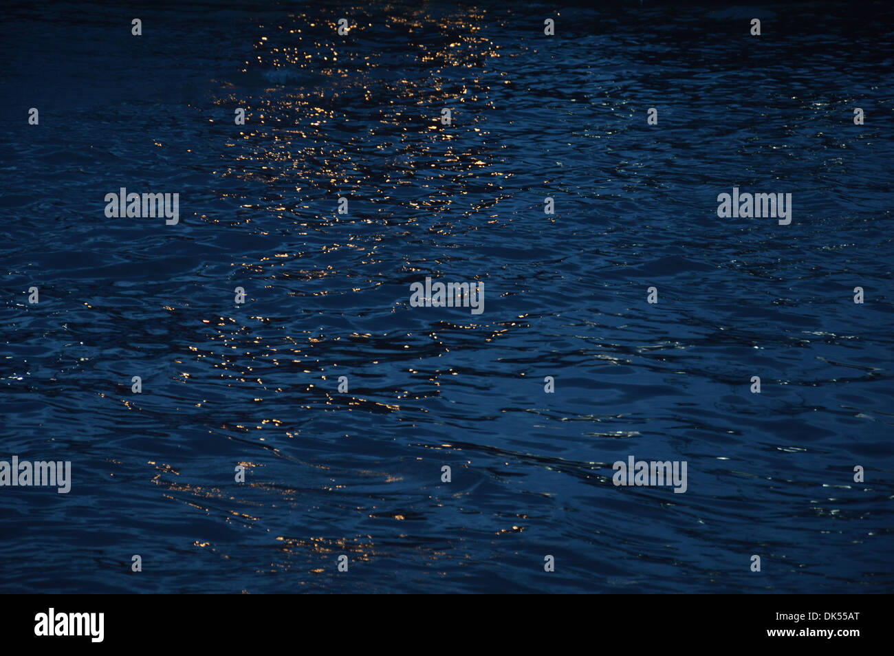 sea water ripples with light reflection in the night Stock Photo - Alamy