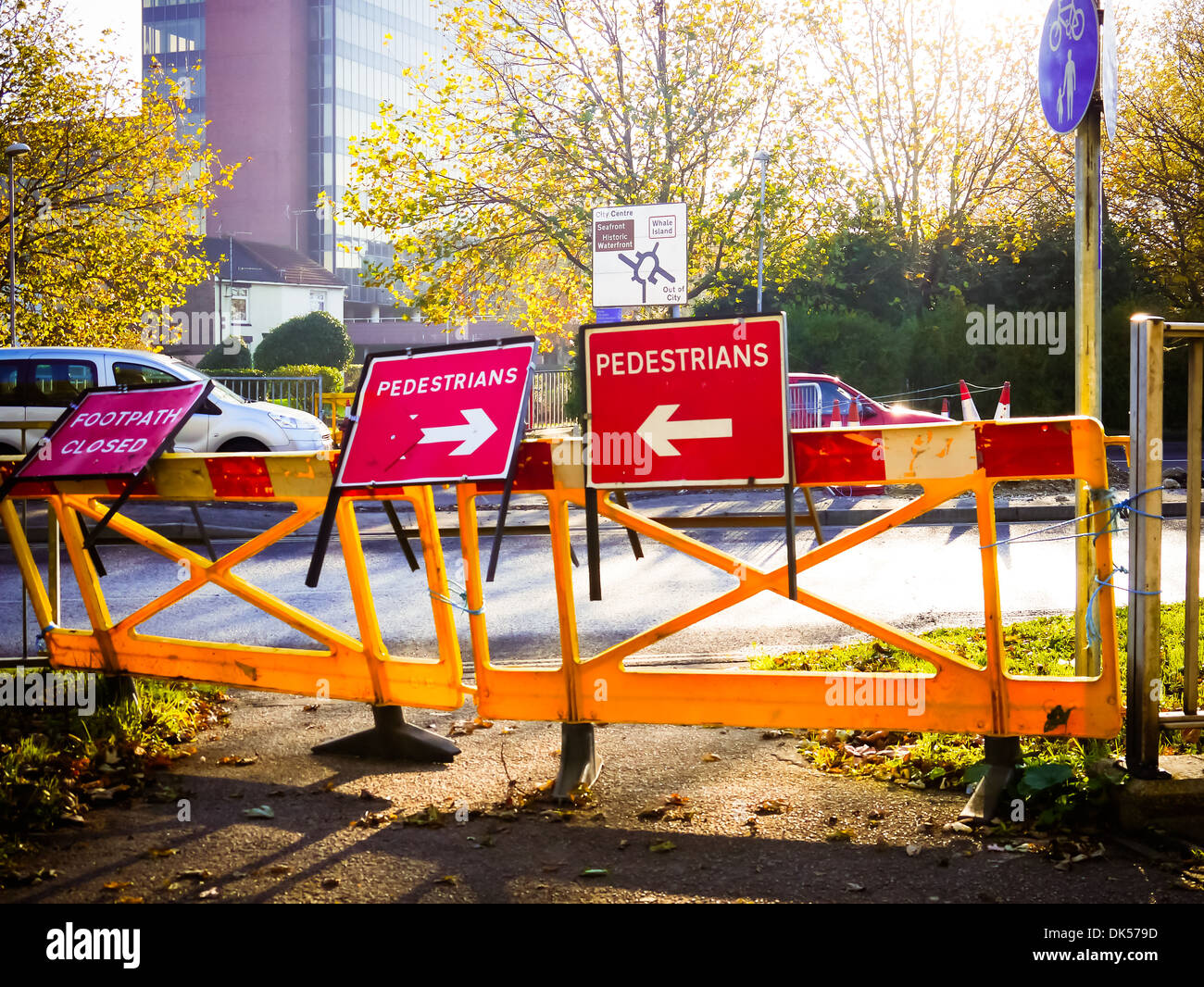 Footpath closed signs with a barrier and direction signs Stock Photo ...
