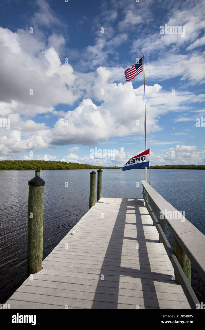 Pier with a flag hi-res stock photography and images - Alamy