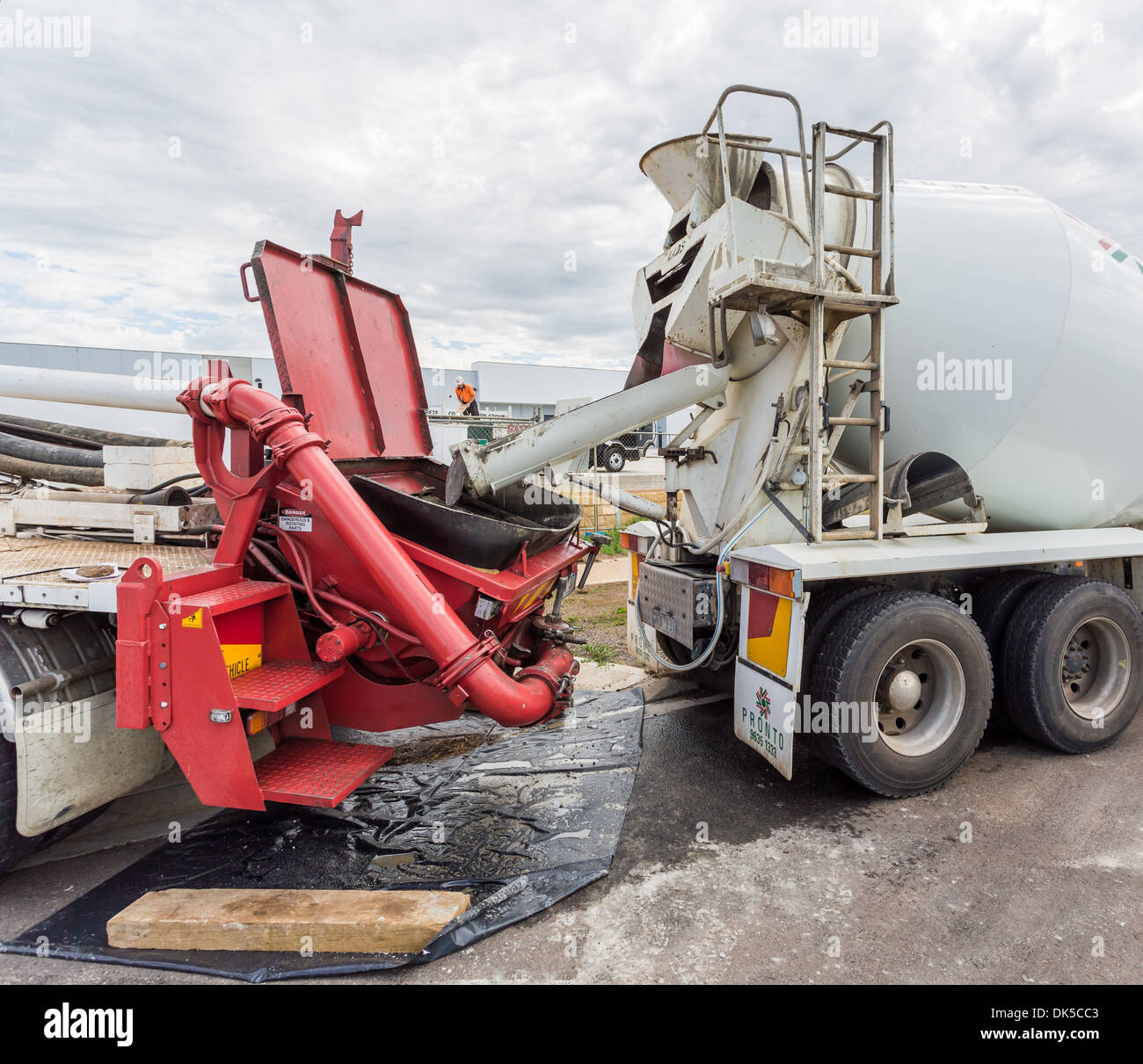 Closeup of Concrete pump truck at construction site Stock Photo - Alamy