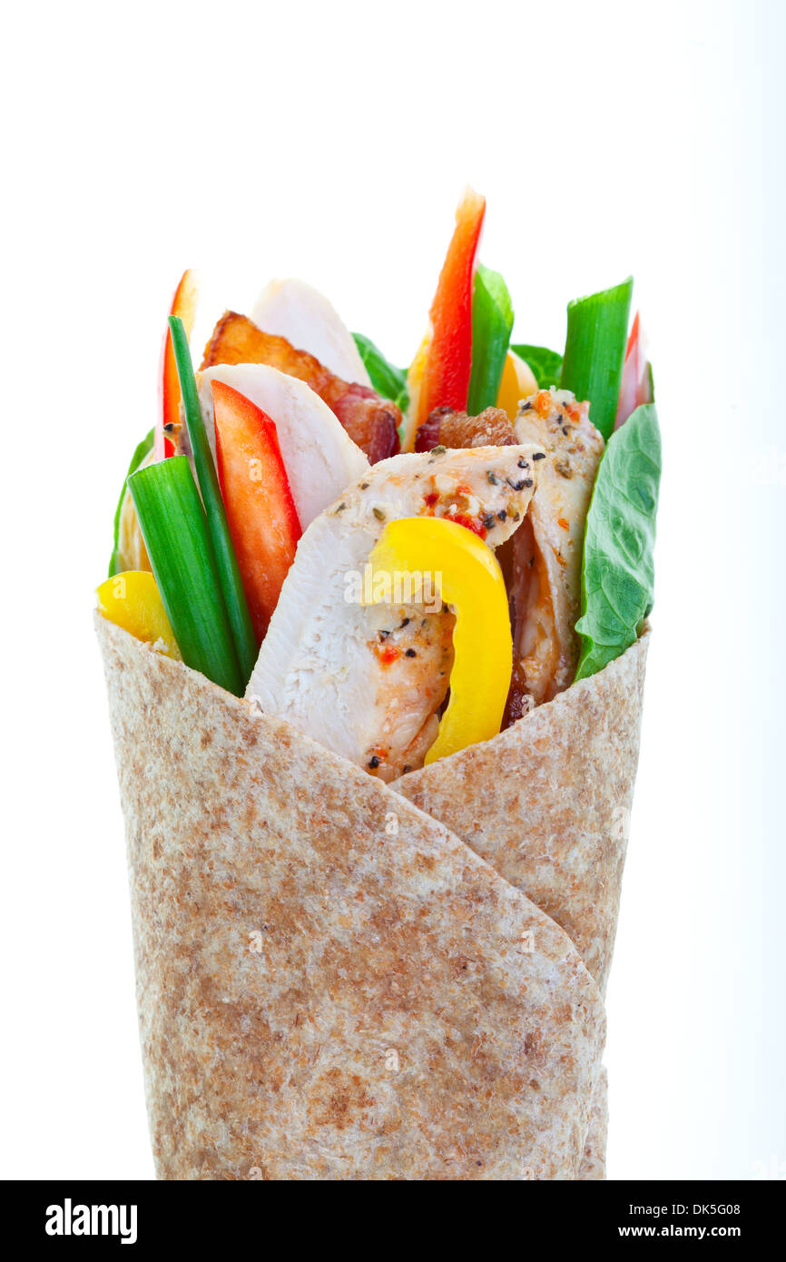 Healthy whole wheat turkey wrap on a white background Stock Photo - Alamy
