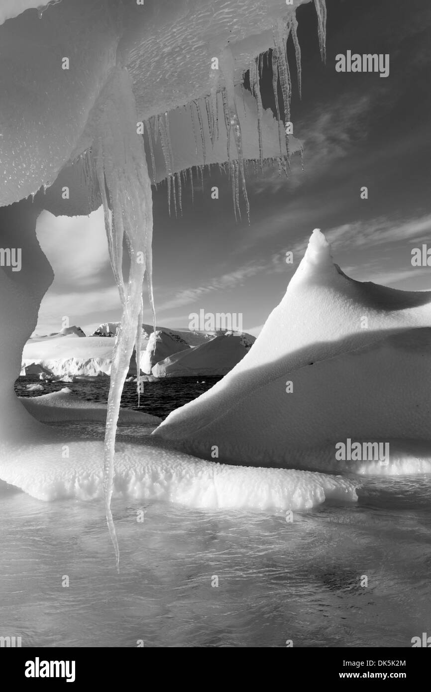 Antarctica, Icicle hangs from melting iceberg floating near Enterprise ...