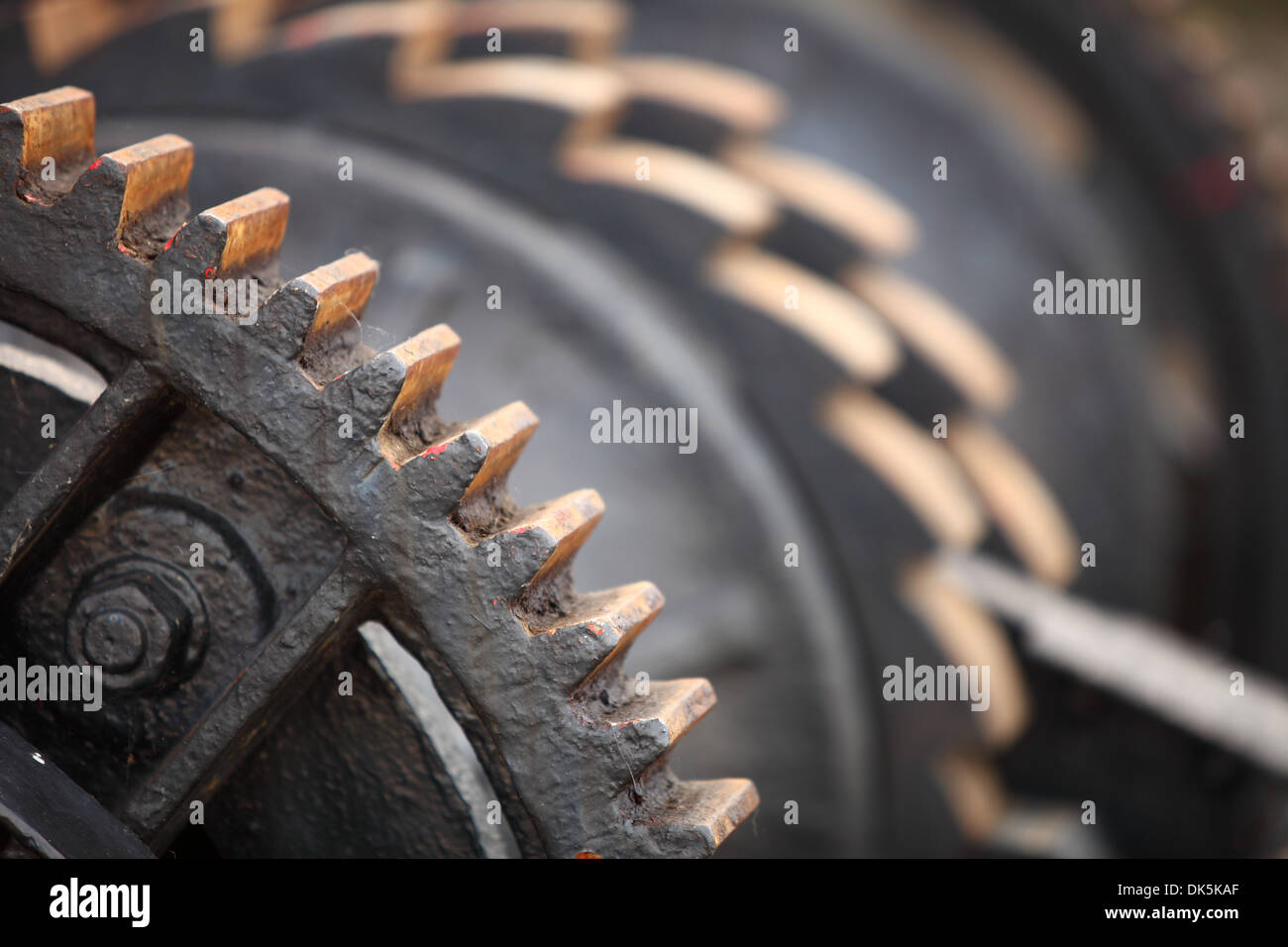 Close up steel cog wheels metal gears mechanical ratchets machine part ...