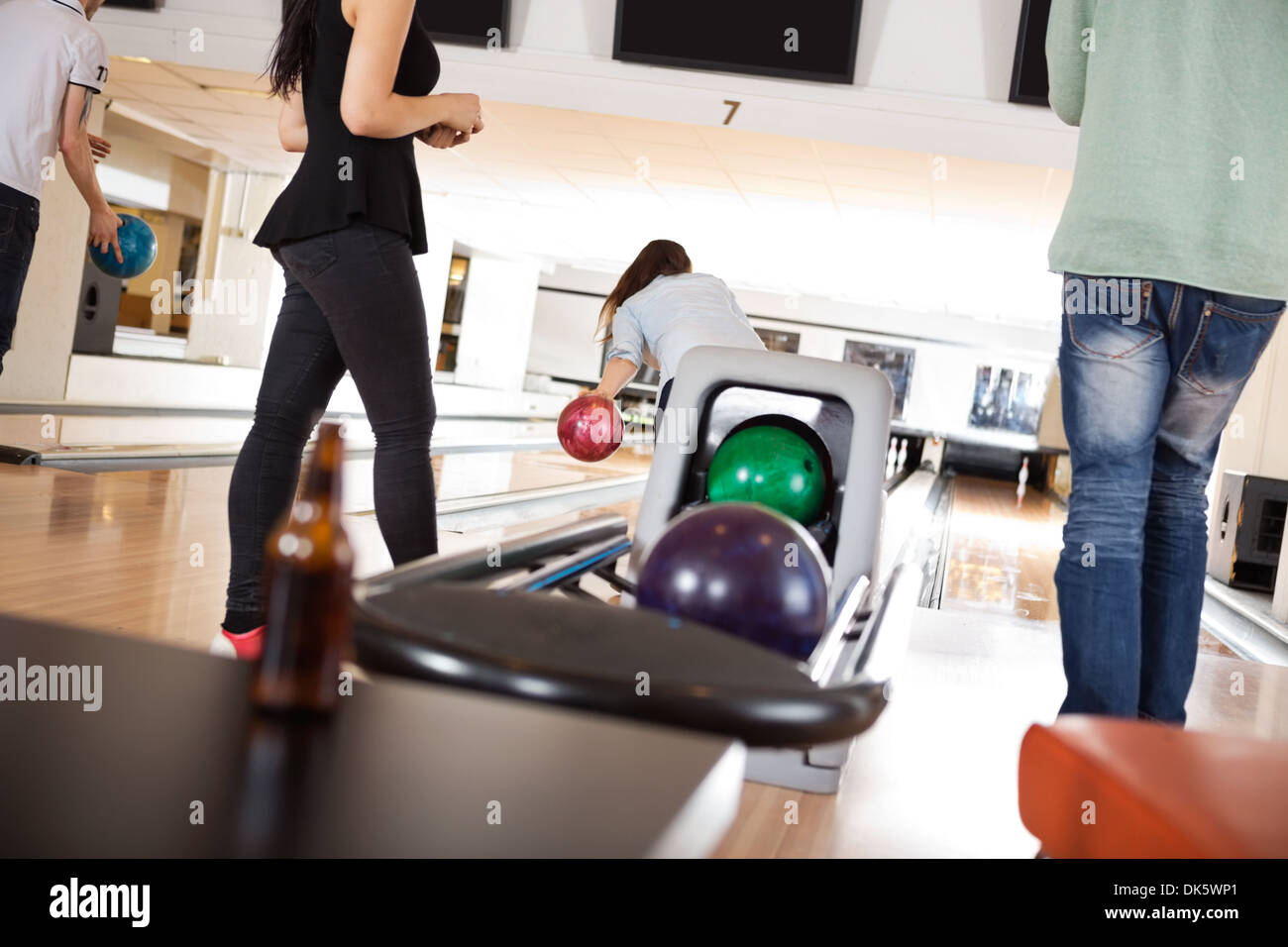 People Playing in Bowling Alley Stock Photo - Alamy