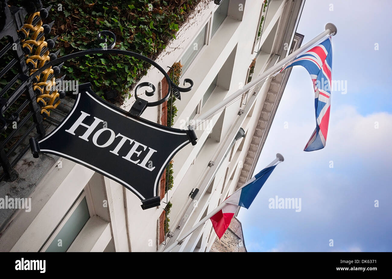 Hotel sign over building entrance Stock Photo - Alamy