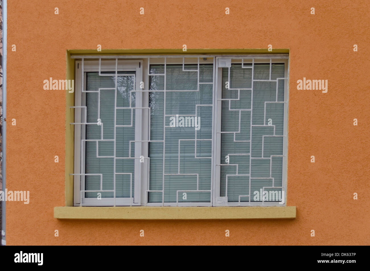 Window with protective grating Stock Photo - Alamy