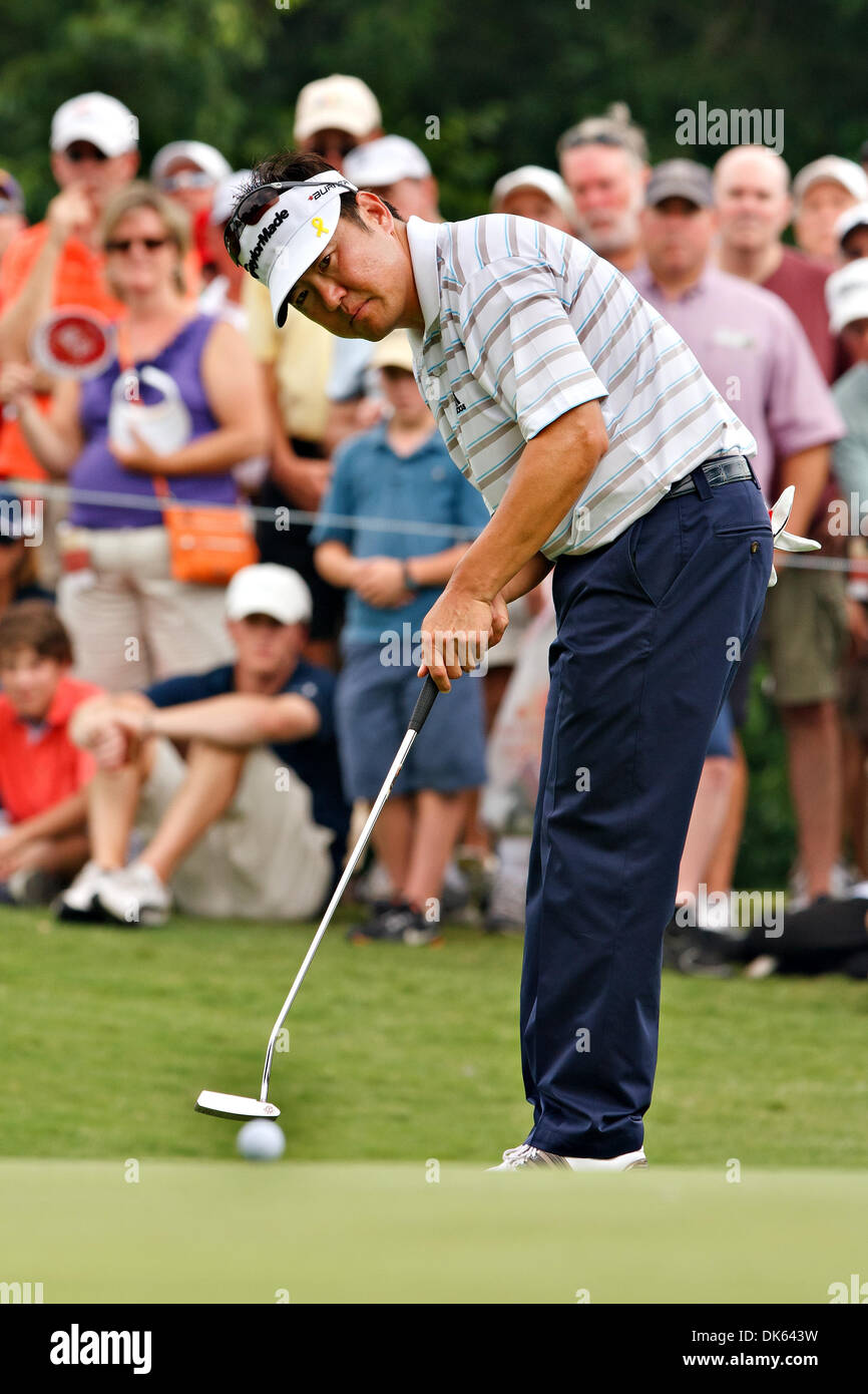 May 22, 2011 - Fort Worth, Texas, US - Charlie Wi lines watches his put ...