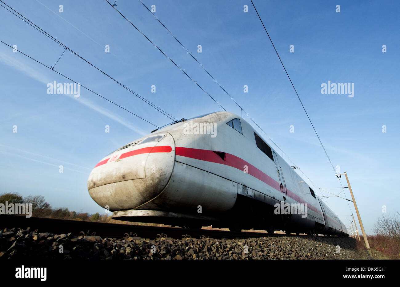 An ICE train of German railway company Deutsche Bahn AG (DB) speeds ...